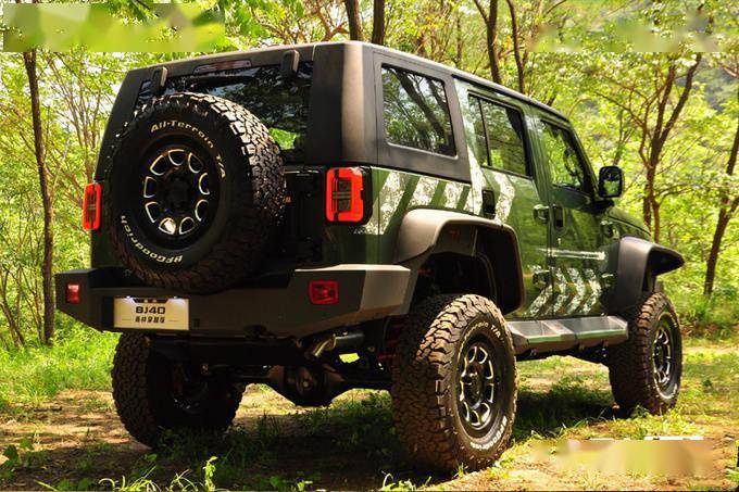 省6万买新款！BJ40雨林穿越版-售26.99万 尺寸大一圈_搜狐汽车_搜狐网